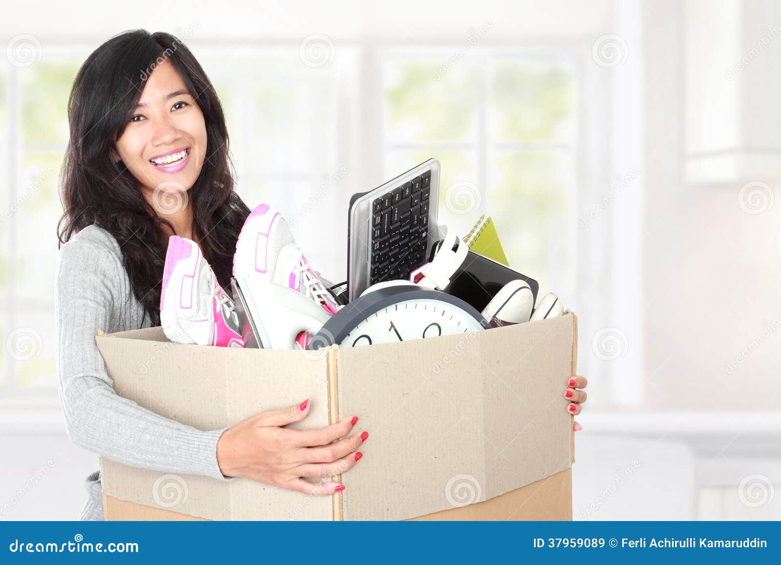 Moving Day. Woman with Her Stuff Inside the Cardboard Box Stock Image ...