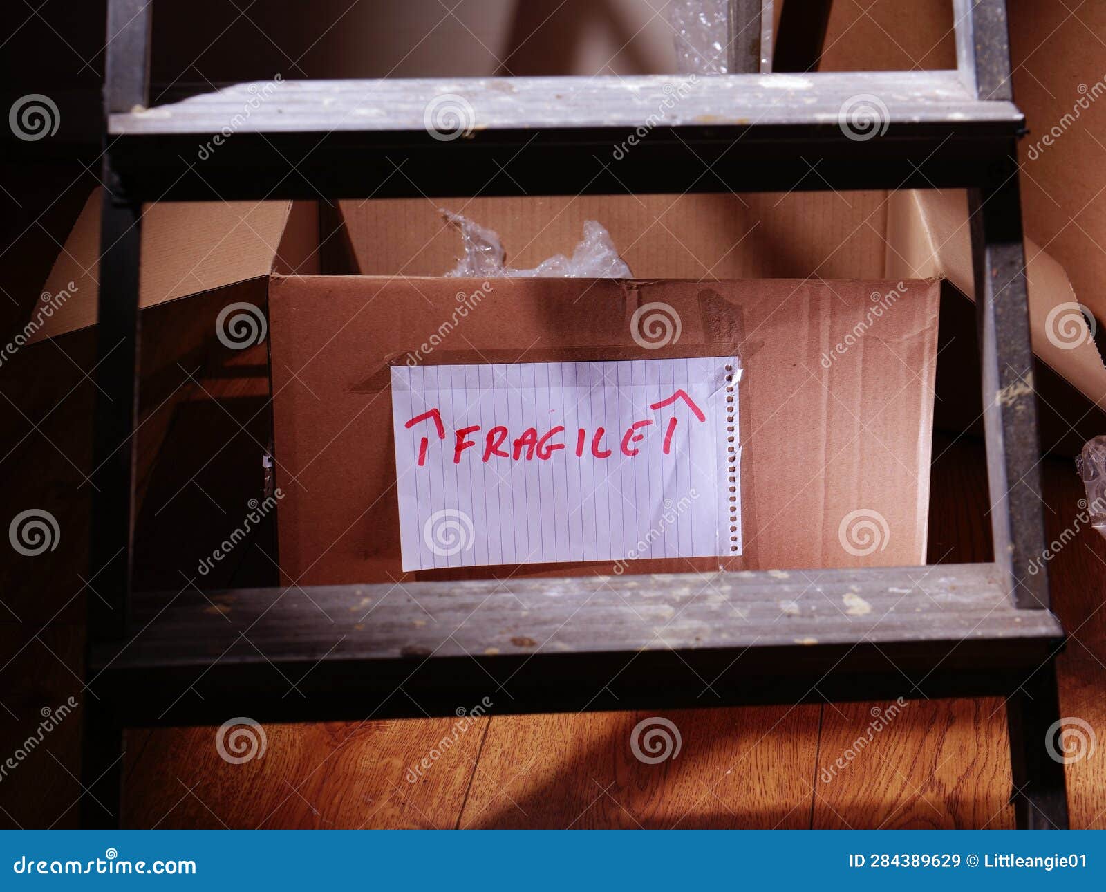 Moving Fragile Items with Cardboard Boxes and Bubble Wrap Stock Image ...