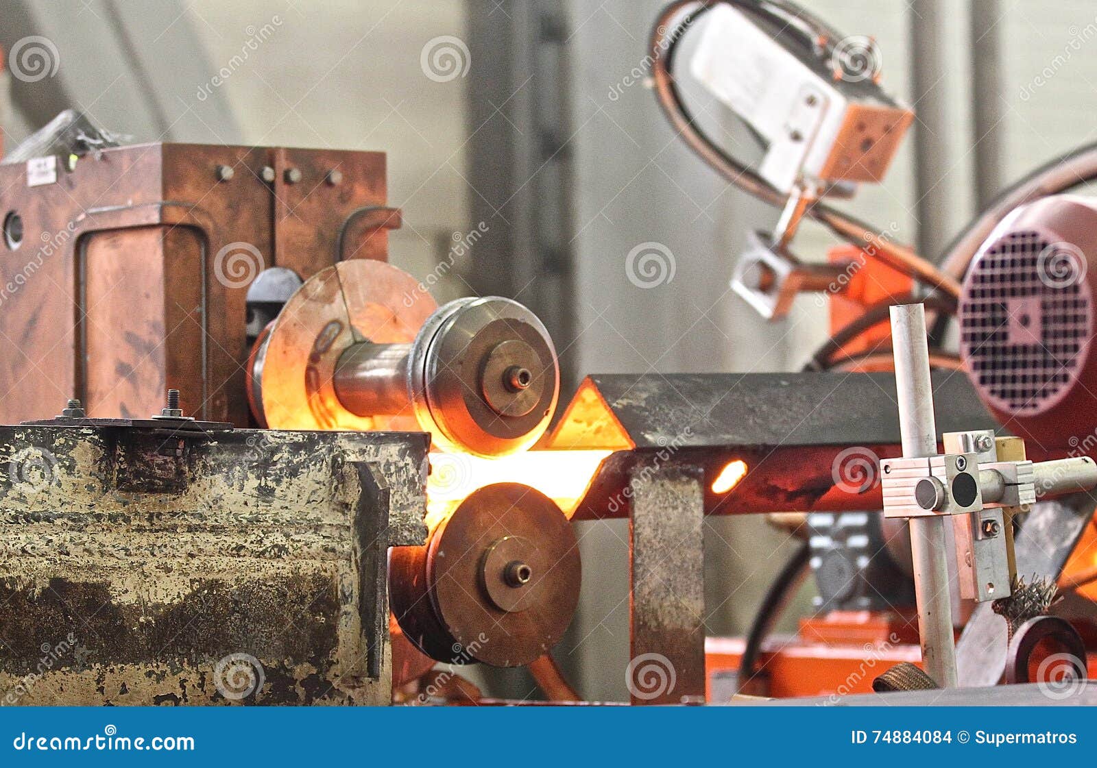Moving the Heated Metal Rod Stock Photo - Image of rollers, manufacture ...