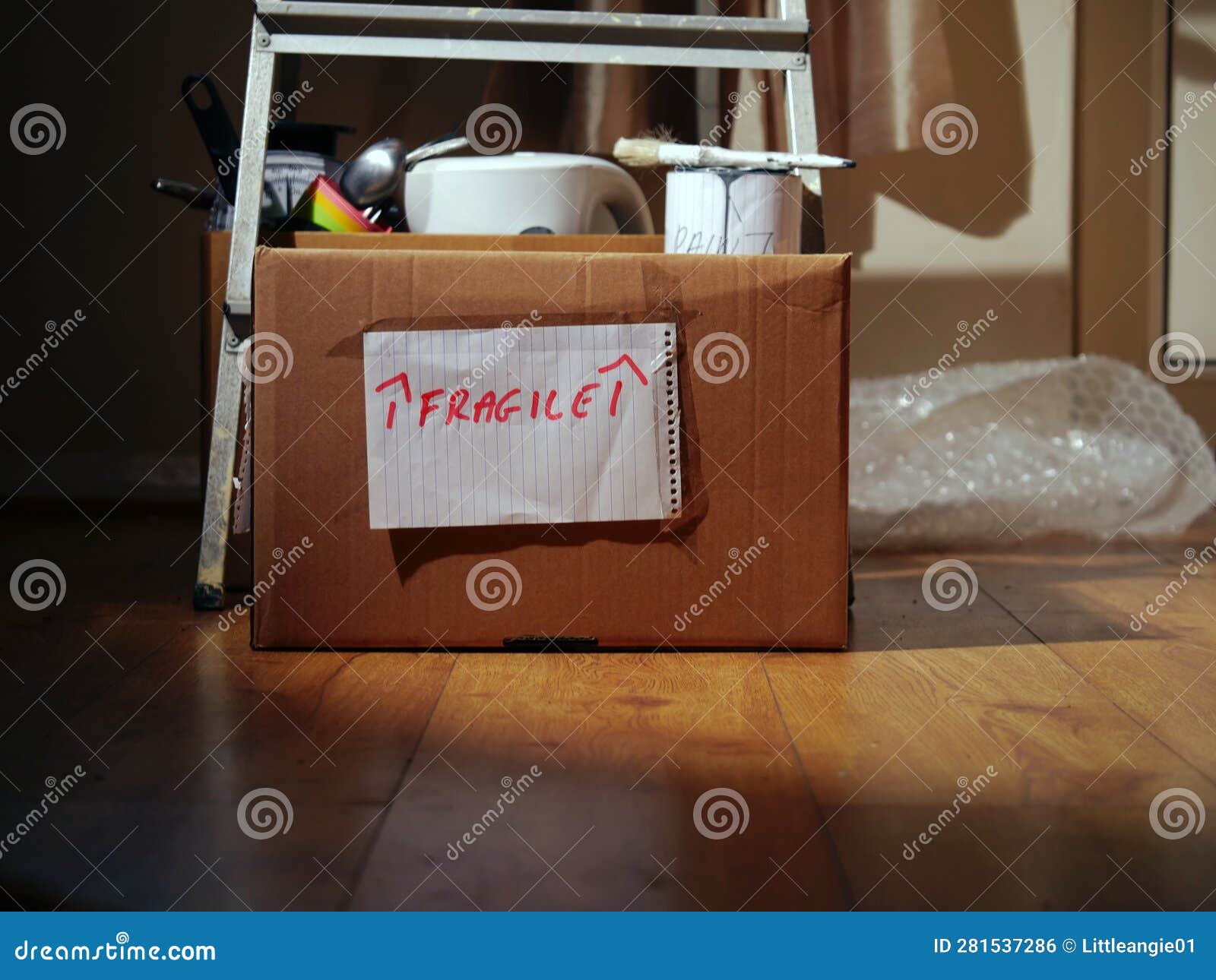 Moving Home with Fragile Kitchen Items in a Box Stock Photo - Image of ...