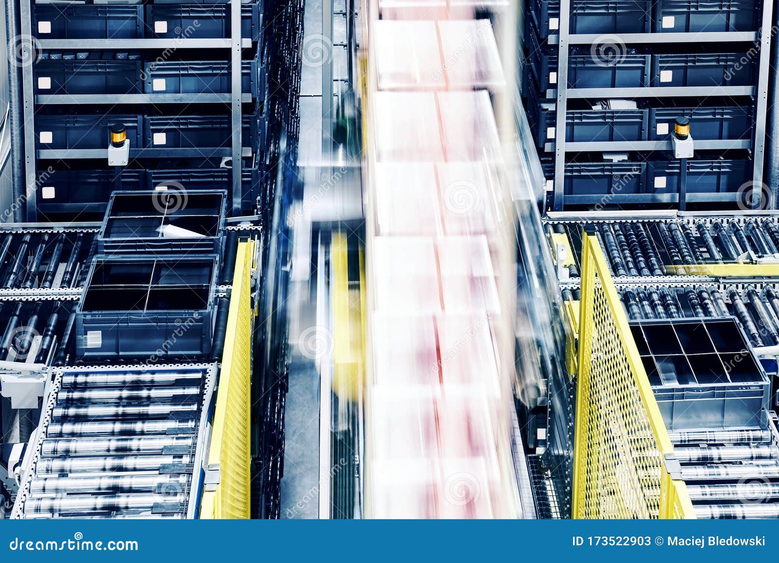 Moving Lift in an Automated Warehouse Stock Image - Image of motion ...