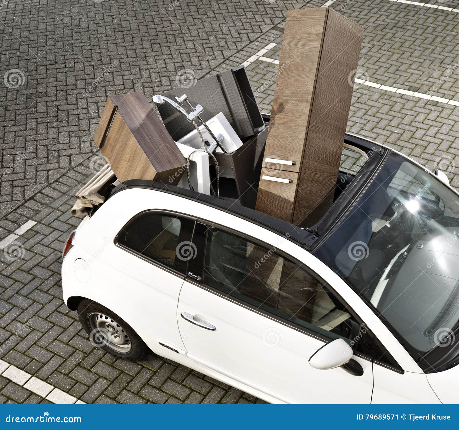 Moving into New Home Using a Small Car Stock Image - Image of camera ...