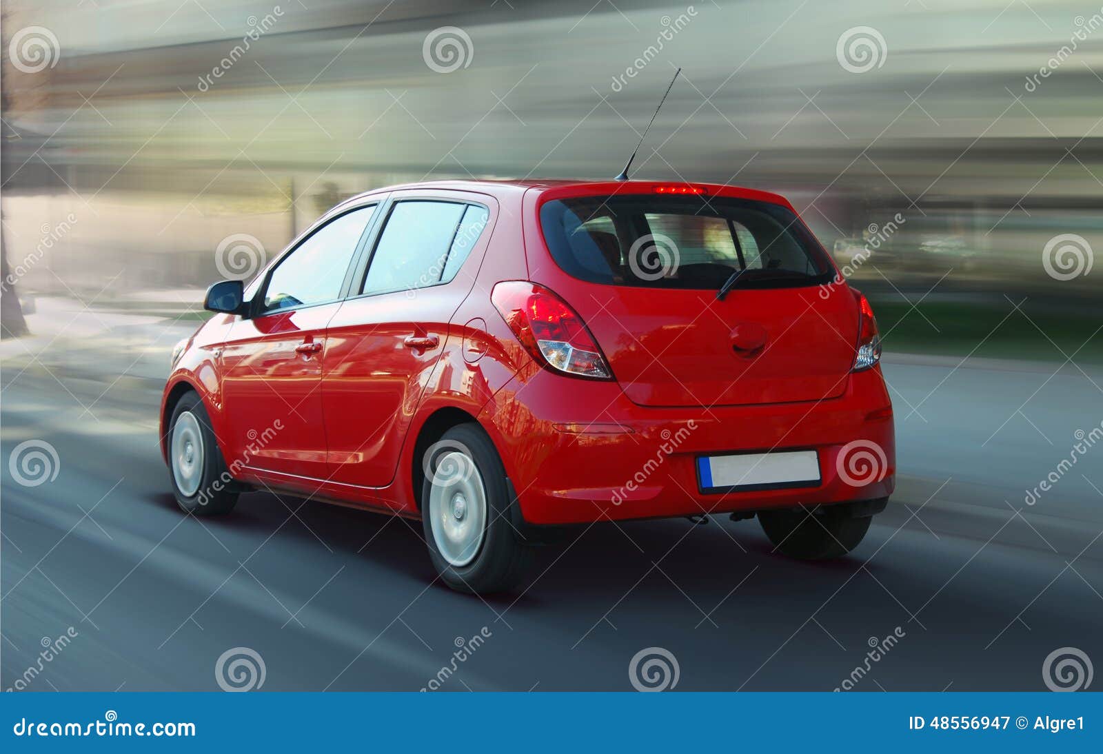 Moving red car stock image. Image of movement, grey, blur - 48556947