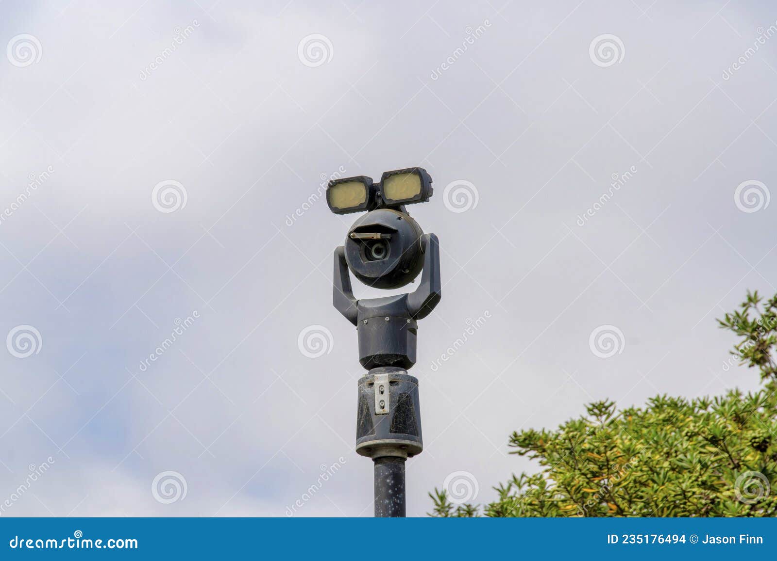 Moving Security Camera on a Post with Lights on Top Stock Photo - Image ...