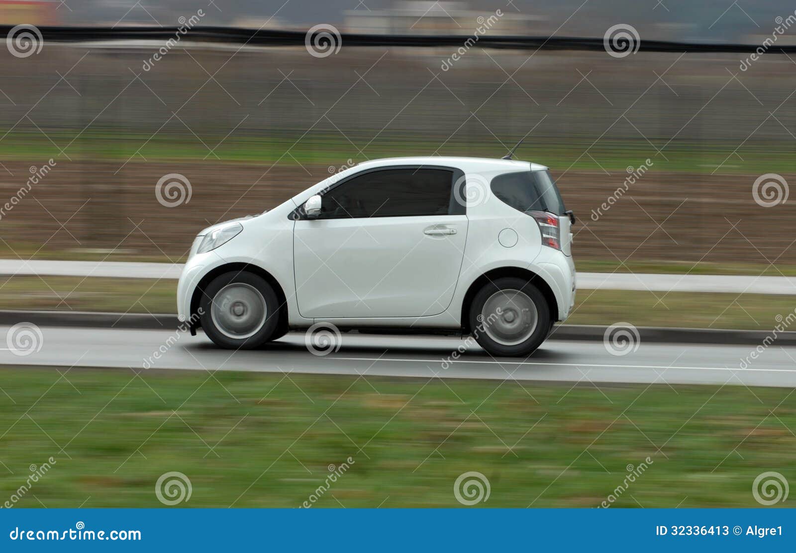 Moving small car stock image. Image of diesel, road, sport - 32336413