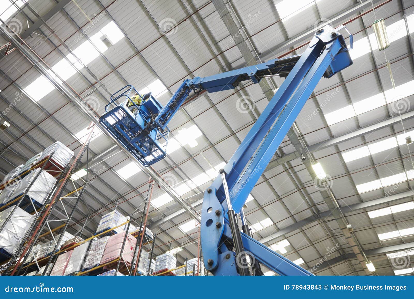 Moving Stock in a Warehouse with a Cherry Picker, Low Angle Stock Image ...