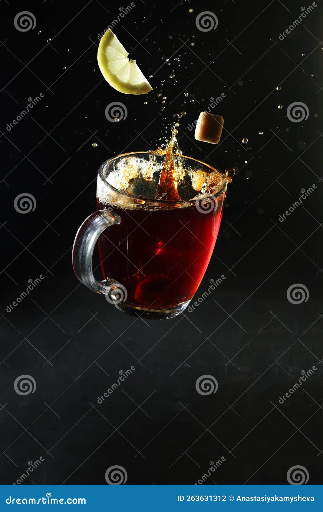A Falling Tea Cup with Lemon and Sugar Stock Photo - Image of beverage ...