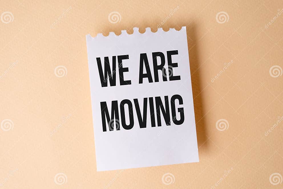 We are Moving Text on White Sticky Note on Yellow Background Stock ...