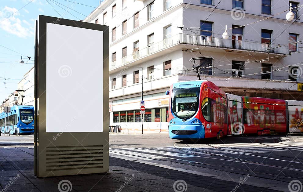 Moving Colorful Modern Tram at Intersection. White Blank Lightbox Ad ...