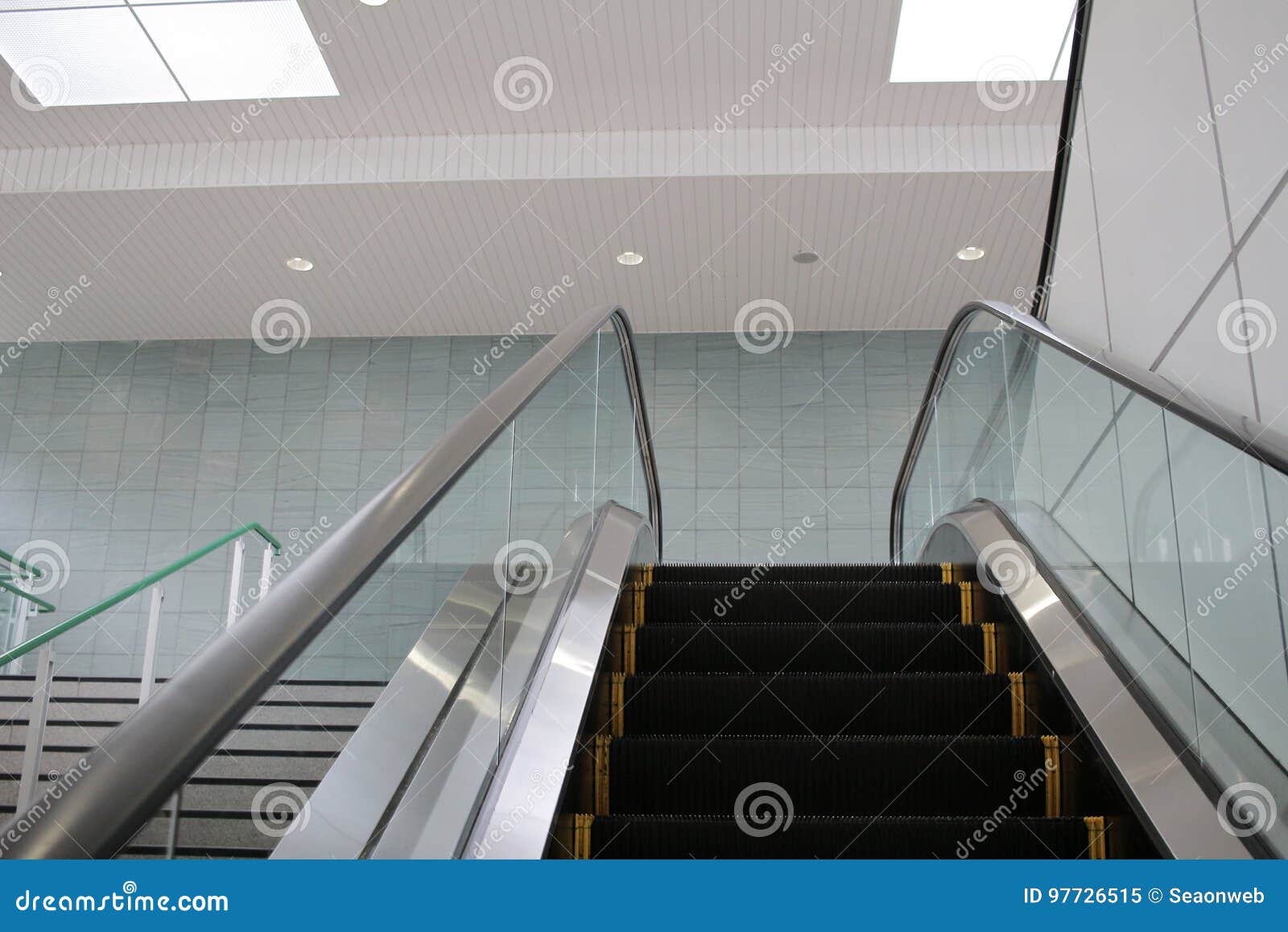 Moving Up in Modern Escalator in Train Station Editorial Image - Image ...