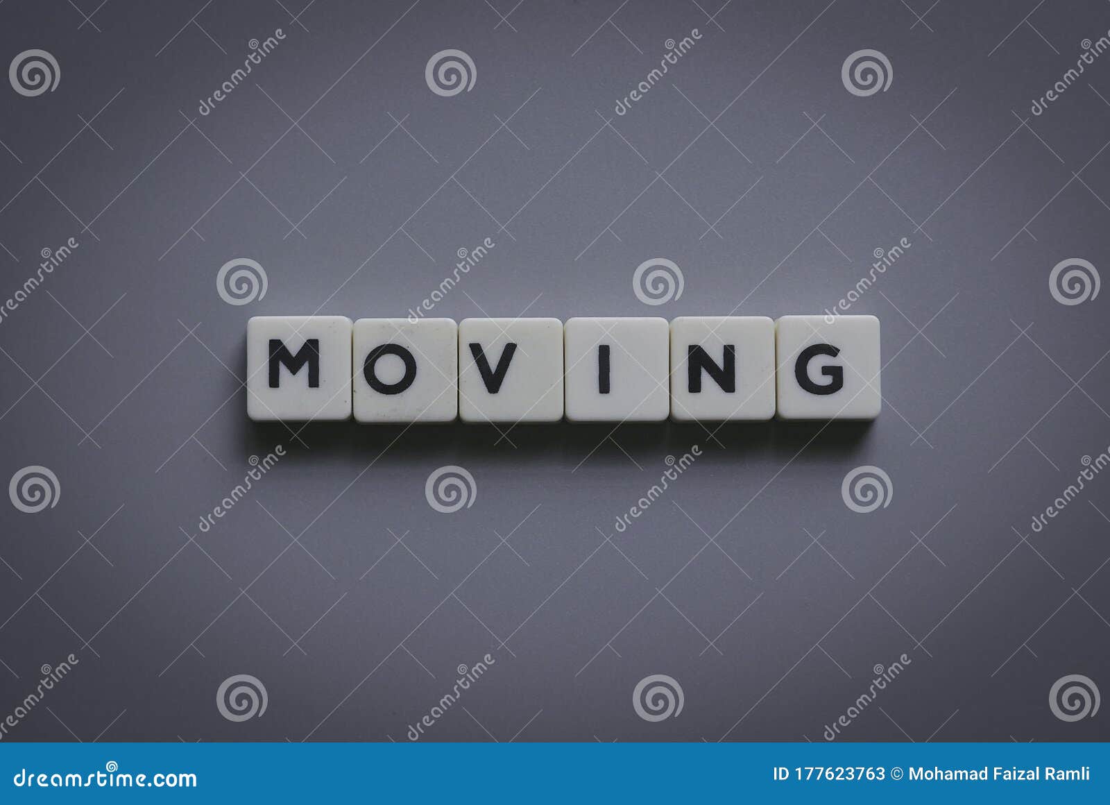 Moving Word Made of Square Letter Word on Gray Background Stock Image ...