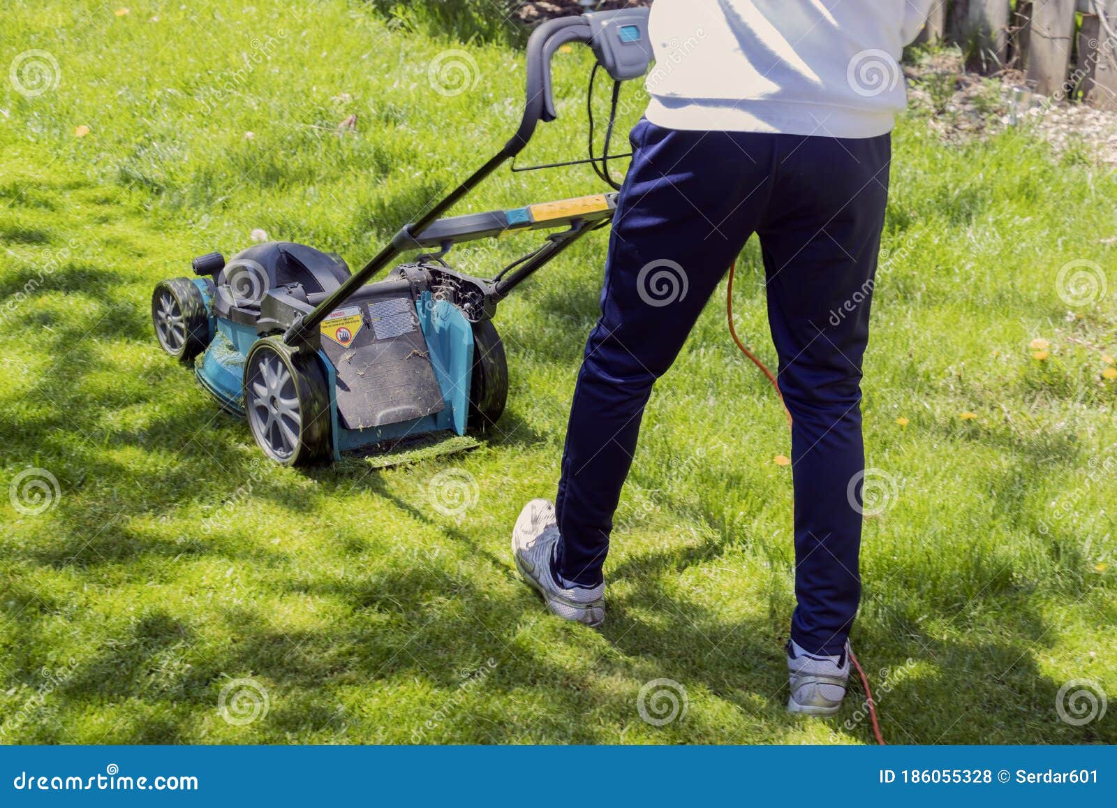 Mowing the lawn stock photo. Image of lawnmower, mowing - 186055328