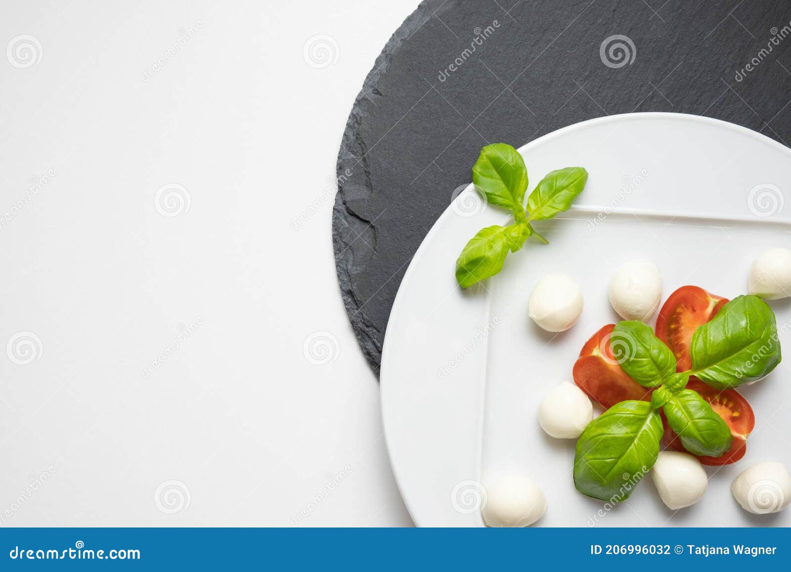 Mozzarella, Fresh Basil and Chopped Tomatoes on a White Plate and on a ...