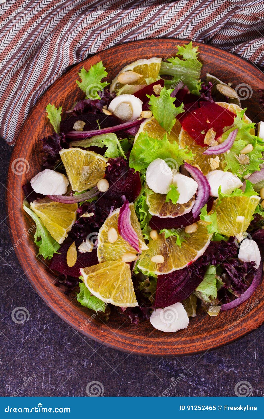 Mozzarella, Orange, Beetroot, Red Onion, Nuts and Seeds Salad. Stock ...