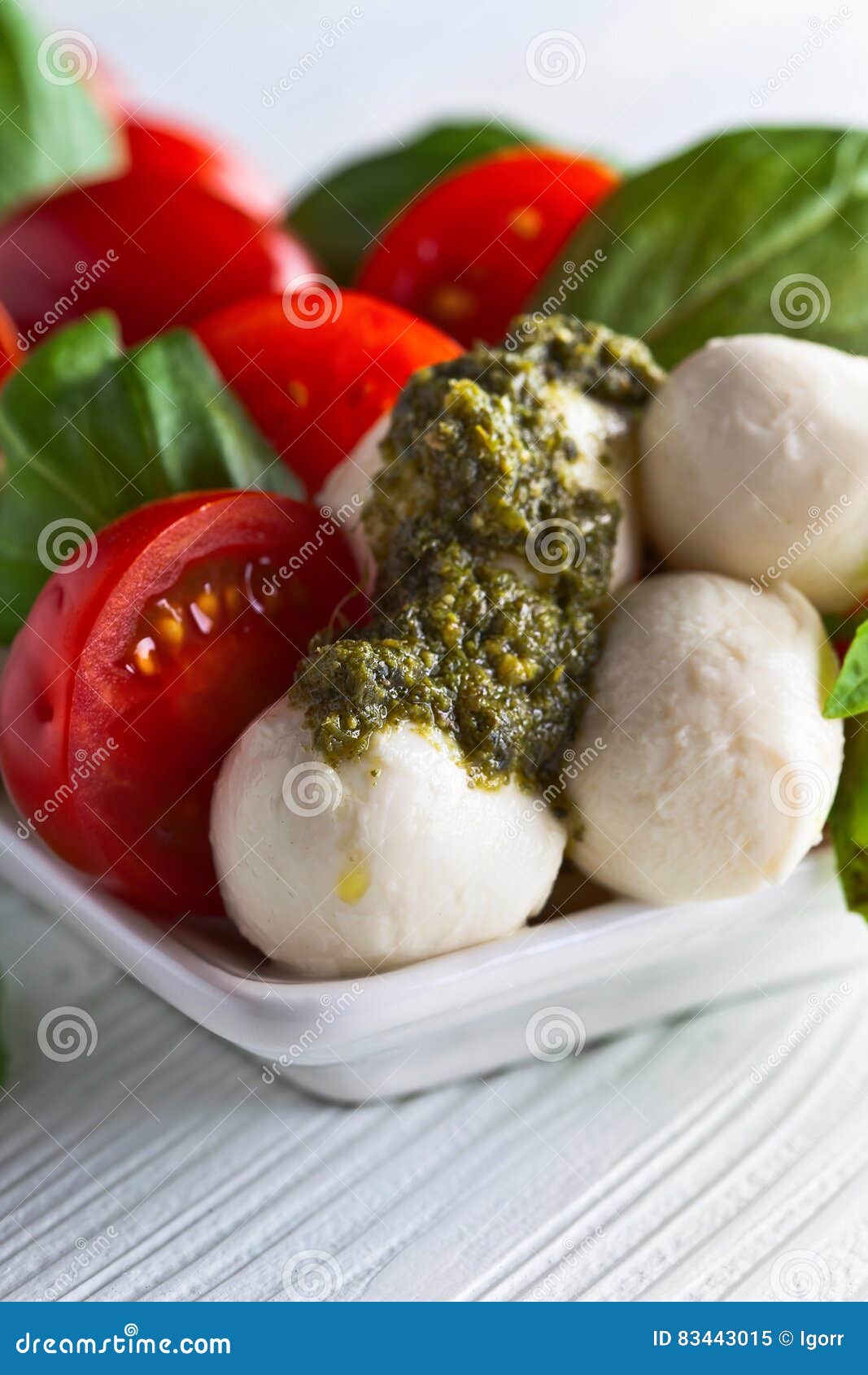 Mozzarella with Tomato , Basil and Pesto Sauce Stock Image - Image of ...