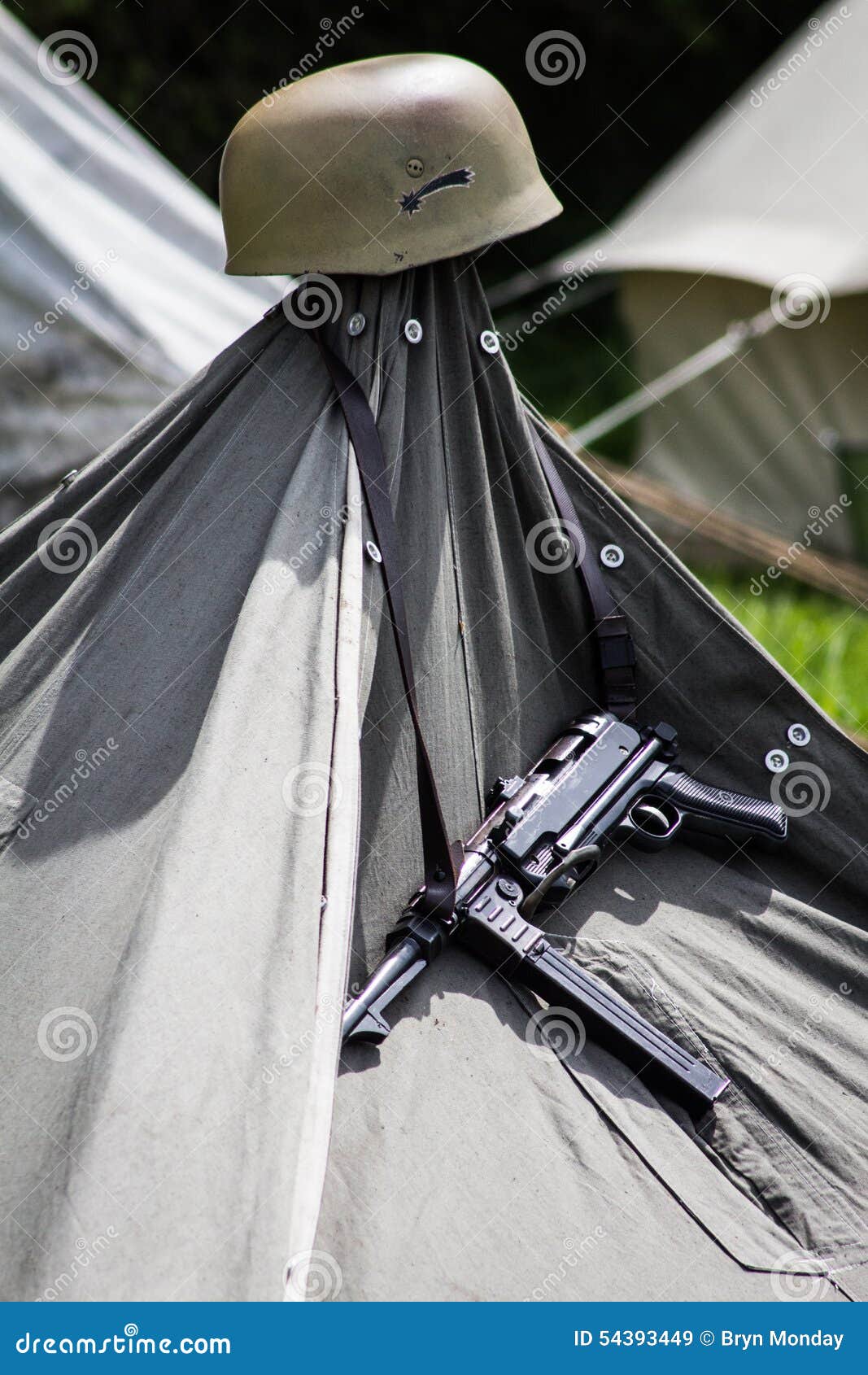 MP 40 and Helmet Hanging on a Tent Stock Image - Image of firearm ...