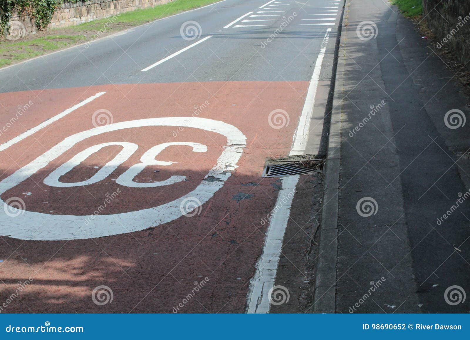 30mph sign on road surface stock photo. Image of 30mph - 98690652