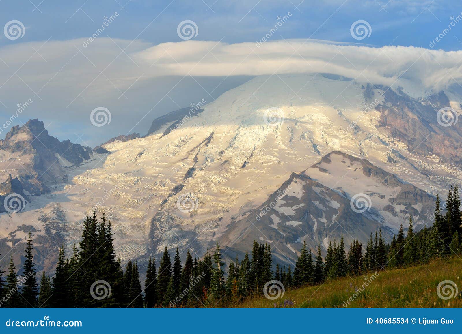 Mt. Rainier with Lenticular Clouds on a Windy Day Stock Photo - Image ...