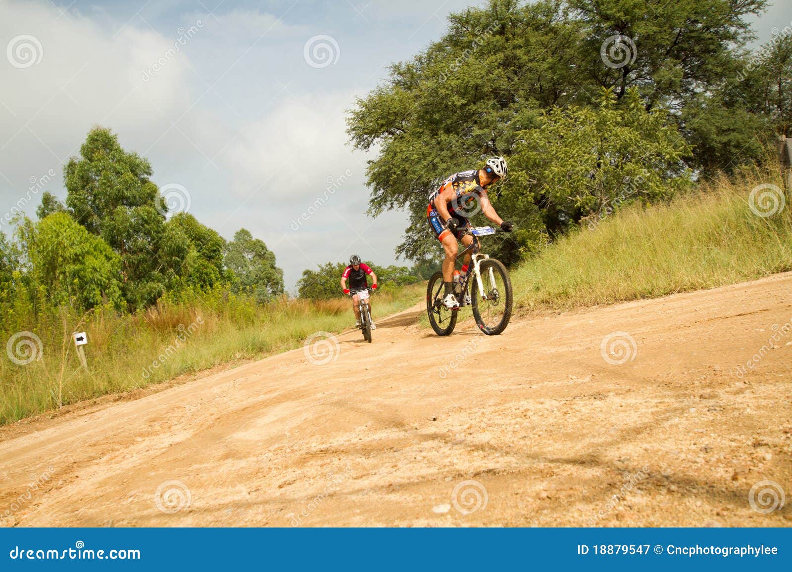 MTB Rider Looking Back at Competitor Editorial Photography - Image of ...