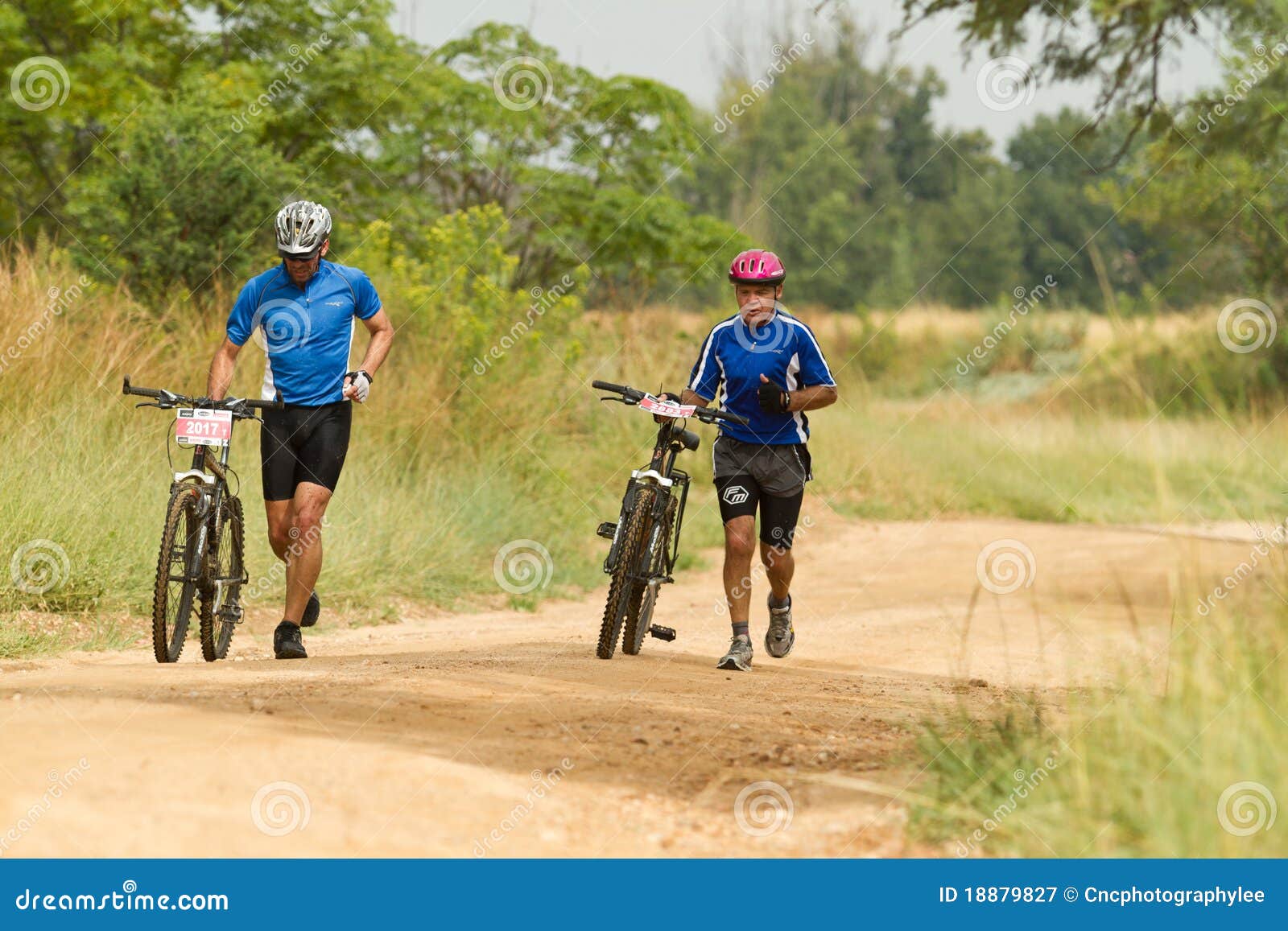 MTB Riders Running Next To Bicycle Editorial Photography - Image of ...