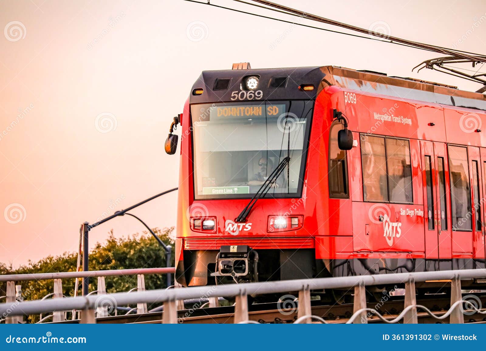 MTS Trolley on Bridge at Sunset Editorial Photography - Image of hour ...