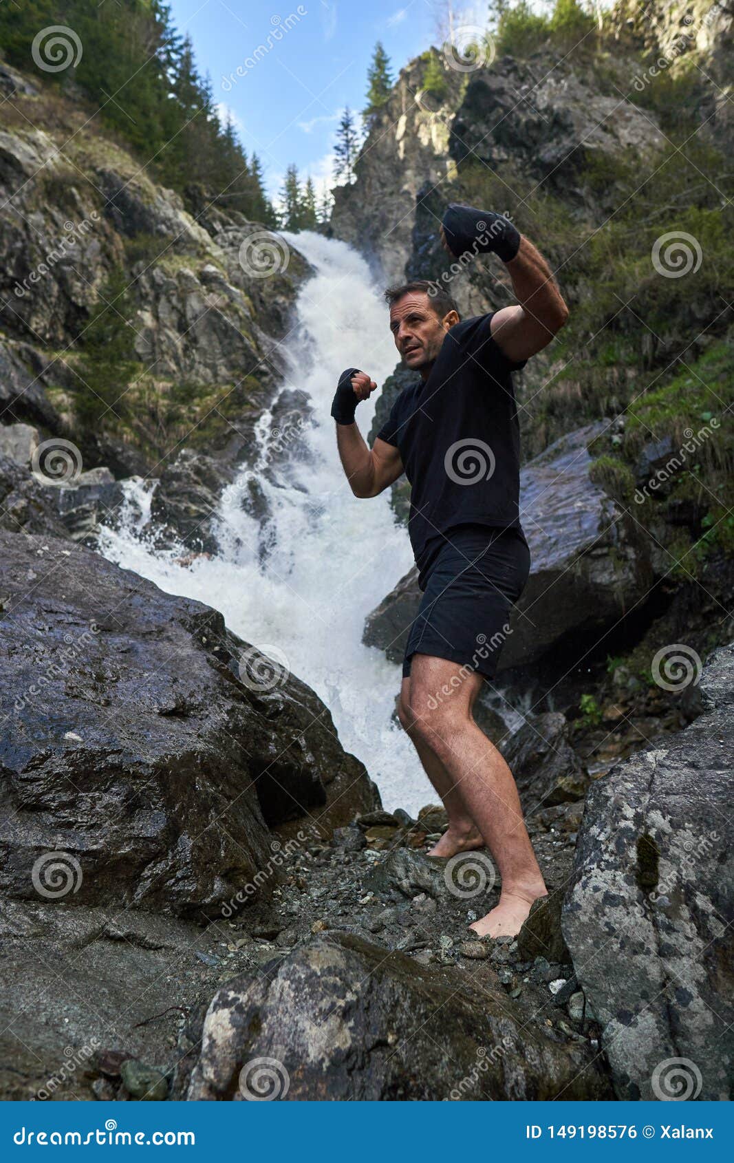 Muay Thai Fighter Training by the Waterfall Stock Photo - Image of fall ...