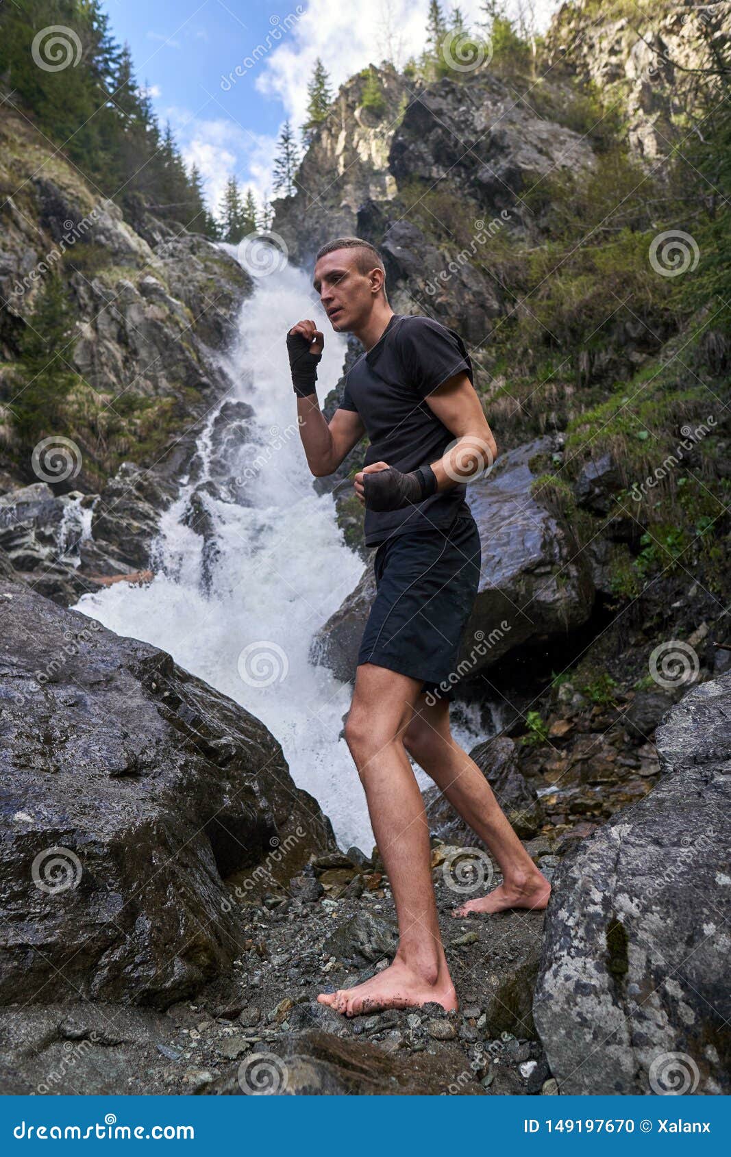 Muay Thai Fighter Training by the Waterfall Stock Photo - Image of fall ...