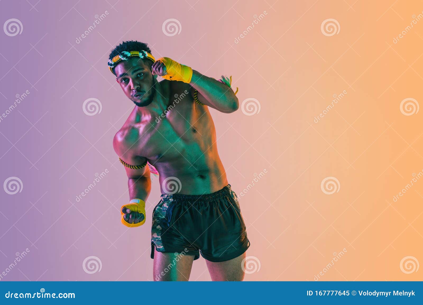 Muay Thai. Young Man Exercising Thai Boxing on Gradient Background ...