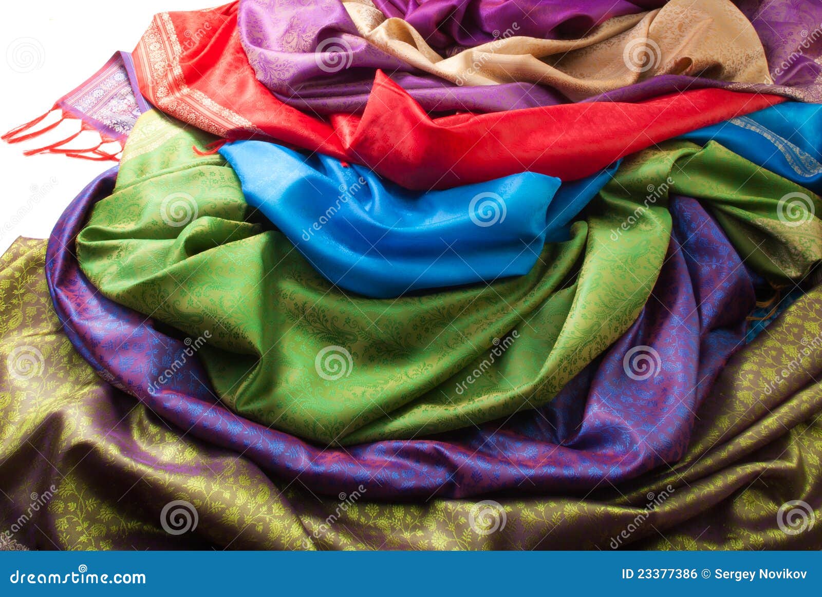 Mucchio dei tessuti fotografia stock. Immagine di decorazione - 23377386