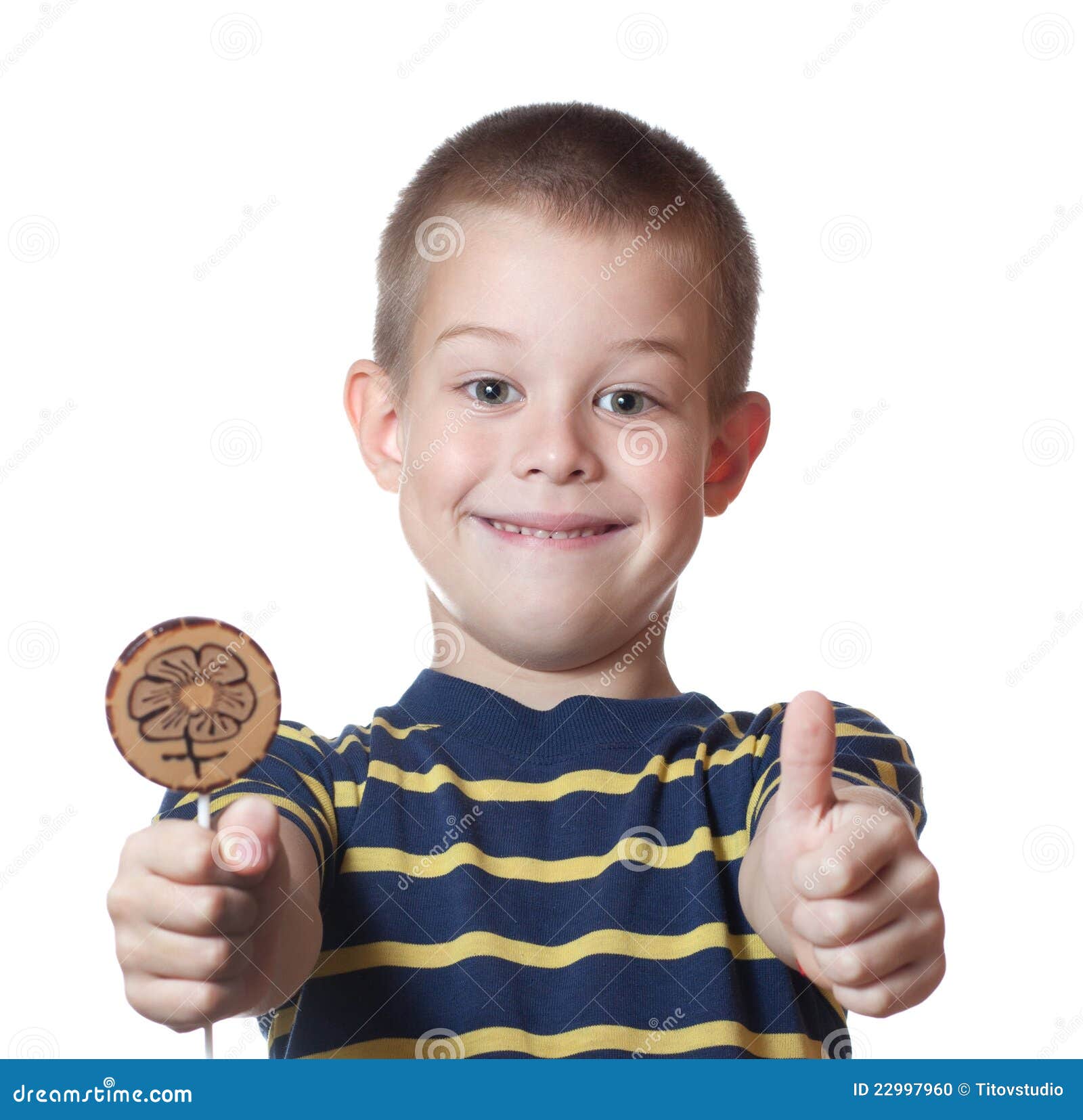 Muchacho Con El Caramelo En Un Palillo Foto de archivo - Imagen de ...