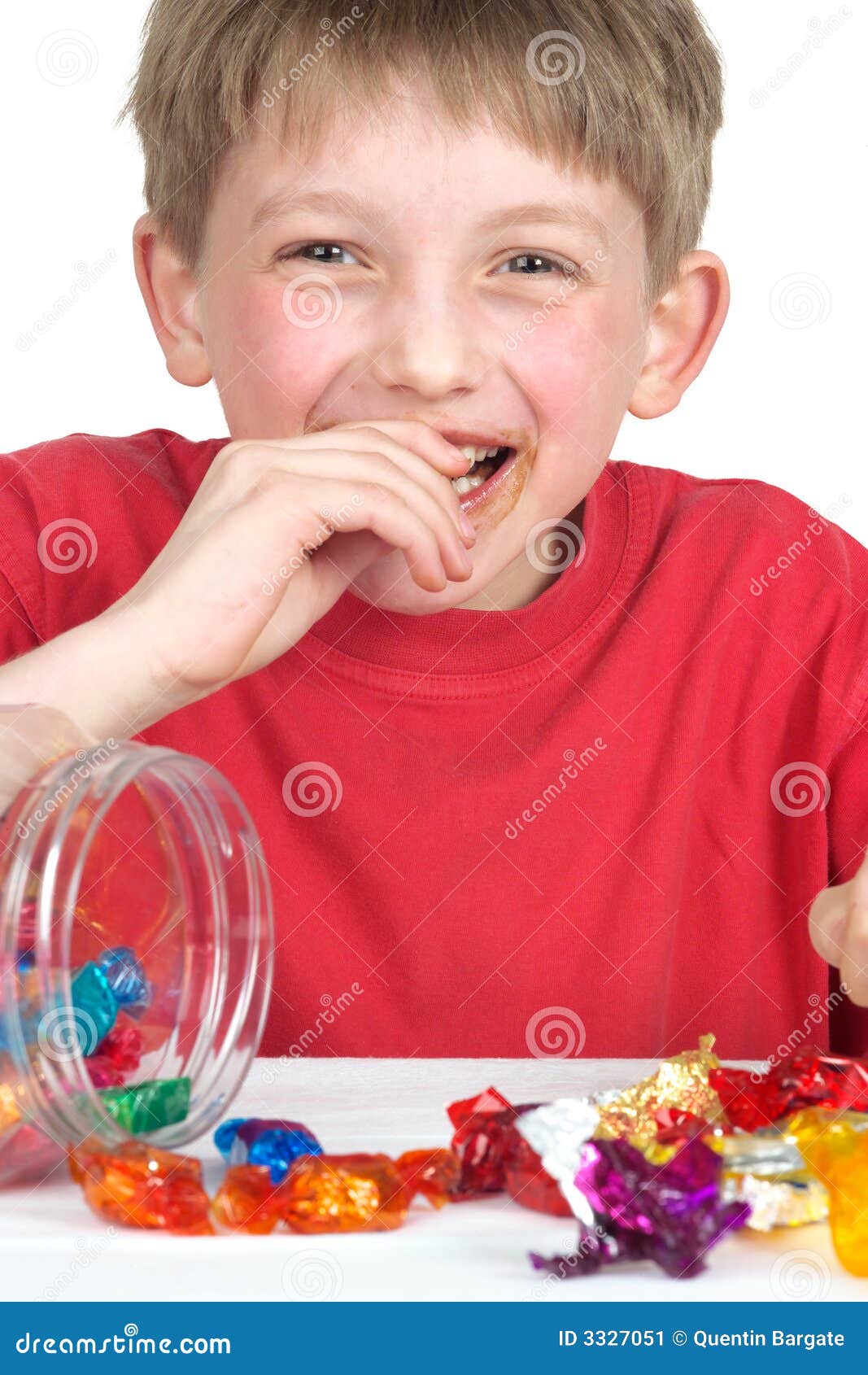 Muchacho De Risa Con El Caramelo Imagen de archivo - Imagen de juventud ...