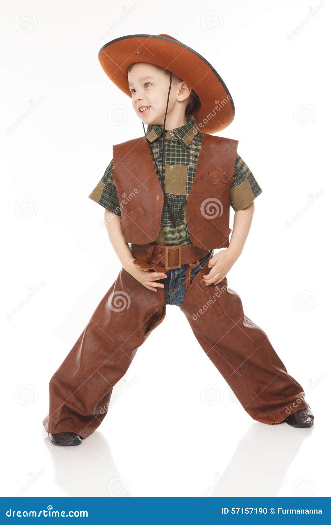 Muchacho En Traje Del Vaquero Foto de archivo - Imagen de vertical ...