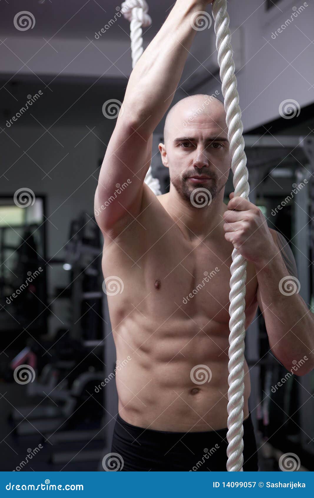 Mucle man with rope stock image. Image of healthy, naked - 14099057