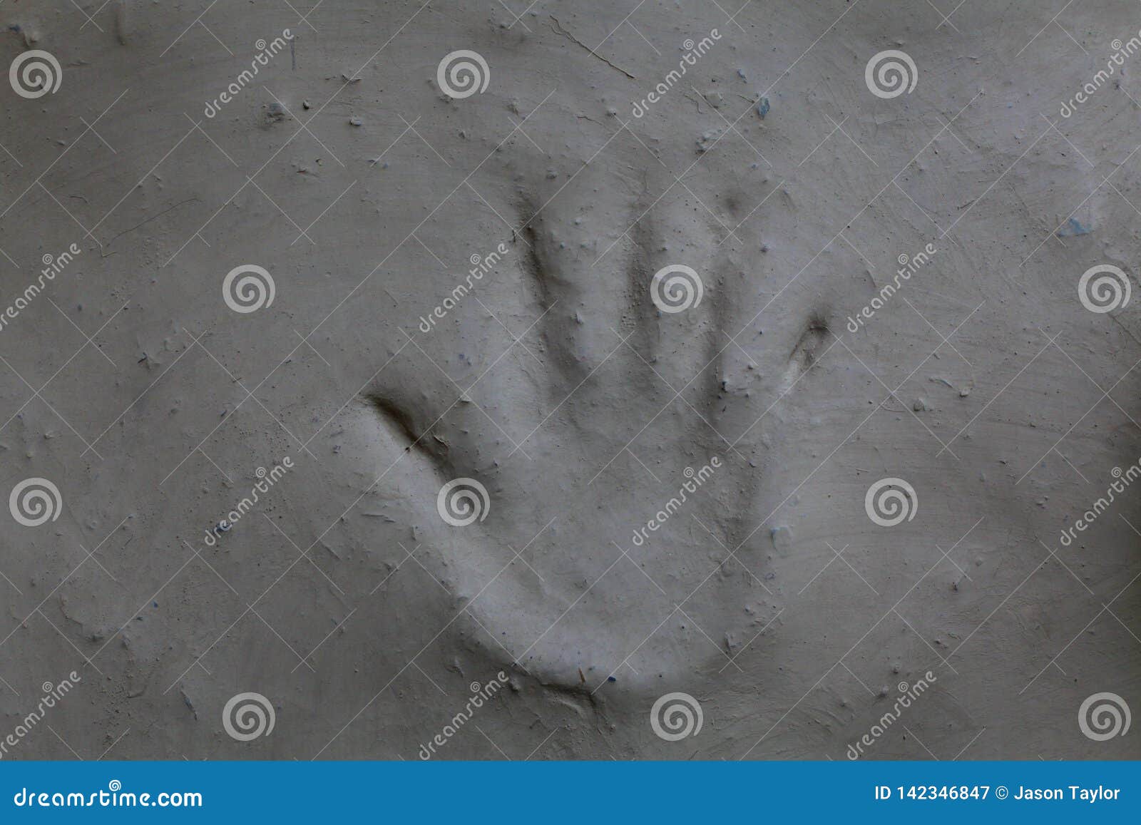 A Mud Plastered Wall with Hand Print or Hand Impression on it Stock ...