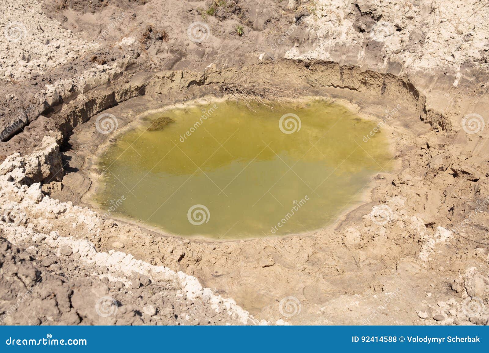 Mud puddles in sand stock photo. Image of messy, damp - 92414588
