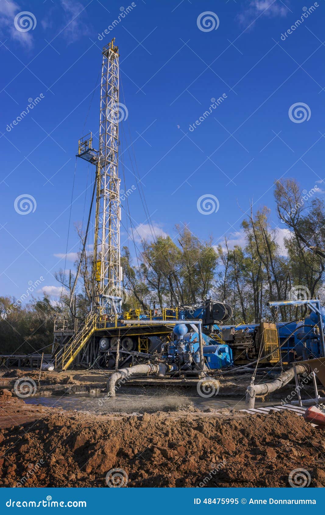 Mud Pumps in Front of Oil Drilling Rig Stock Image - Image of double ...