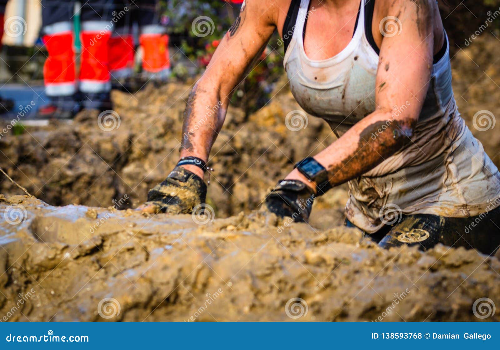 Mud Race Runners, Defeating Obstacles by Using Ropes. Details of the ...