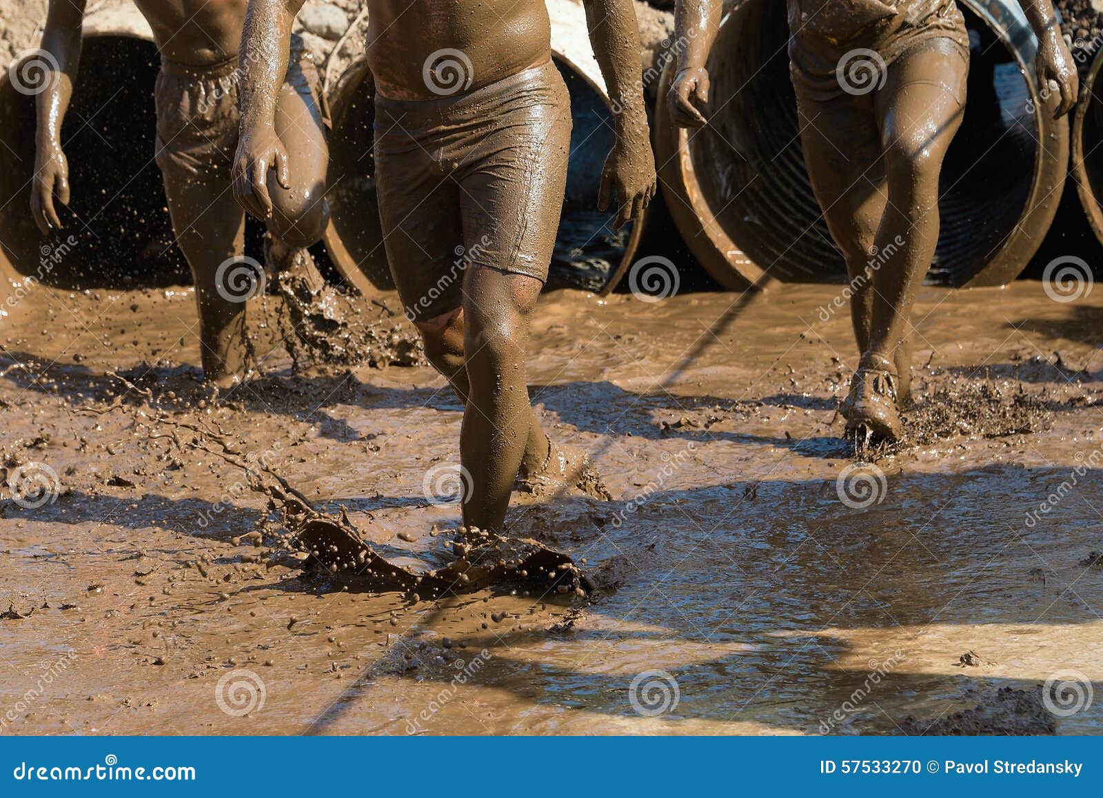 Mud race runners stock photo. Image of muddy, outdoors - 57533270
