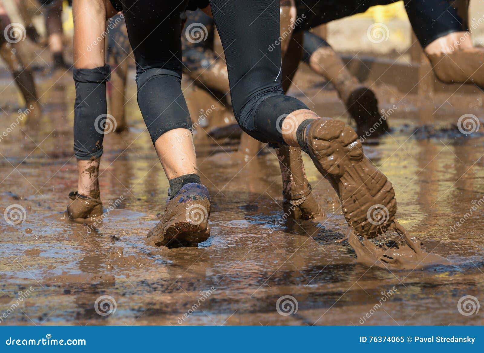 Mud Runners,crawling,passing Under a Barbed Stock Image - Image of ...