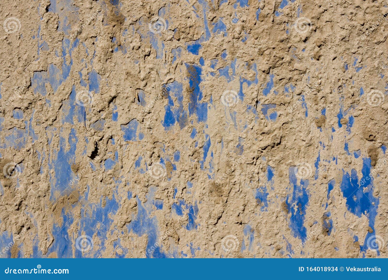 Mud splat on blue Surface stock photo. Image of people - 164018934