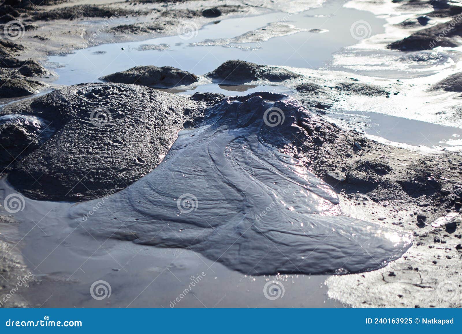 A Mud Volcano and a Stream of Grey Clay from an Eruption and Gas Escape ...