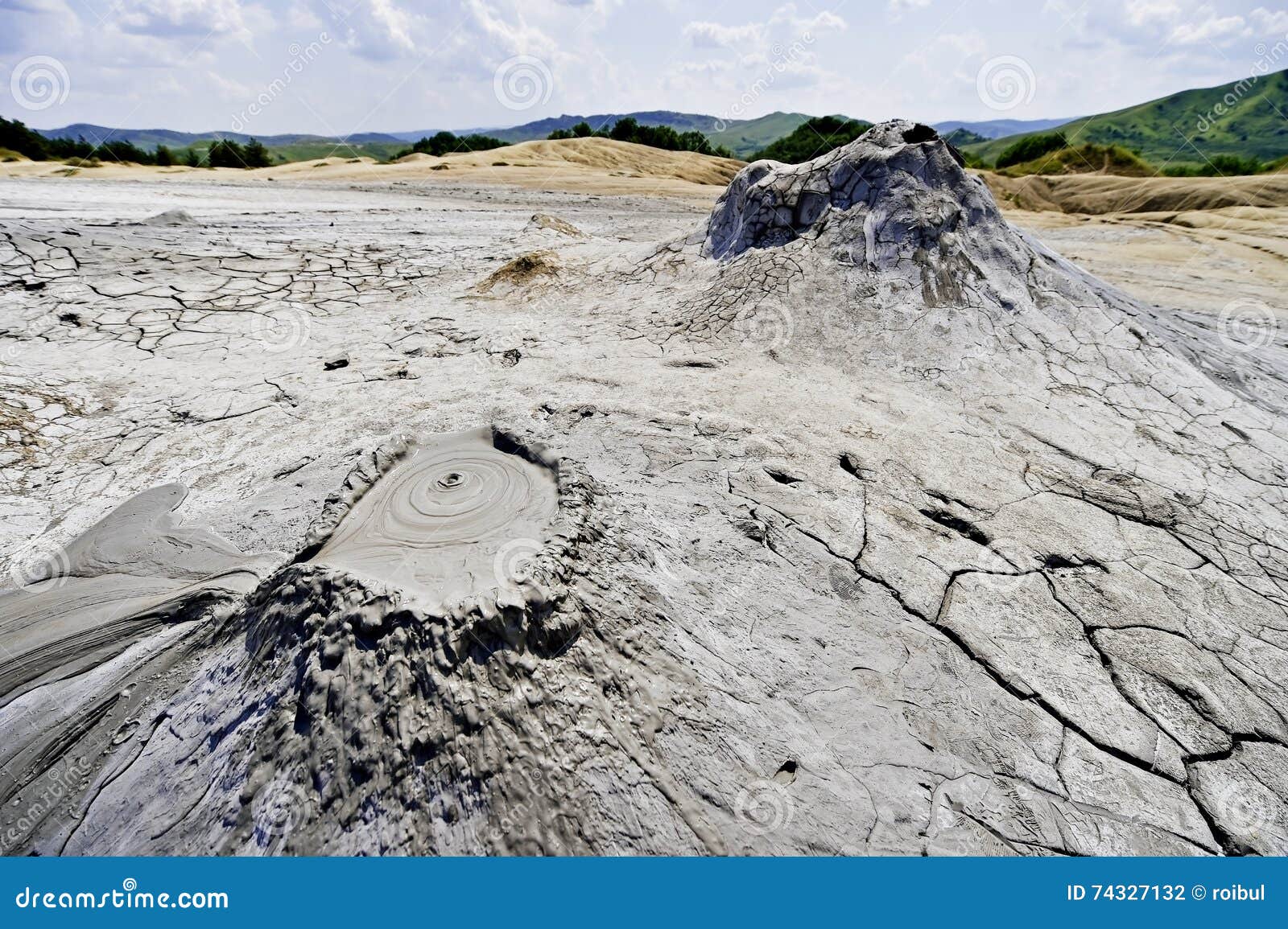 Mud volcanoes erupting stock photo. Image of boil, geothermal - 74327132