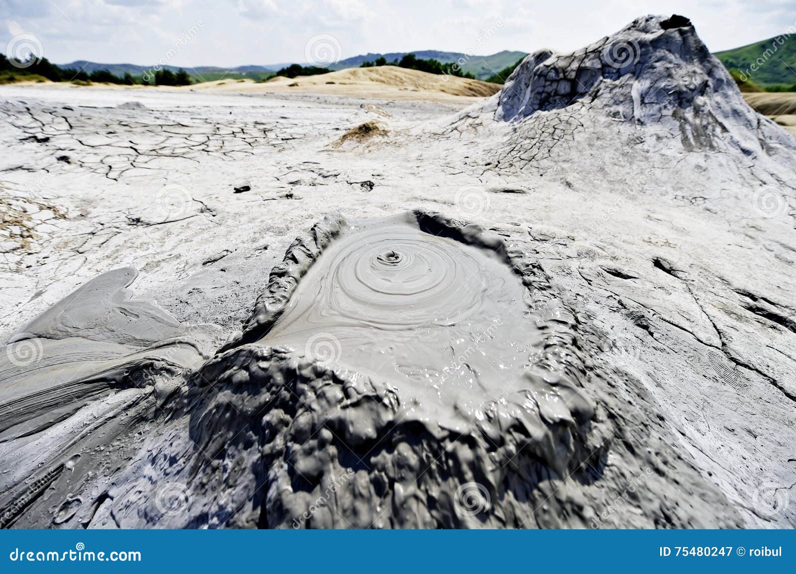 Mud volcanoes erupting stock image. Image of crater, landscape - 75480247