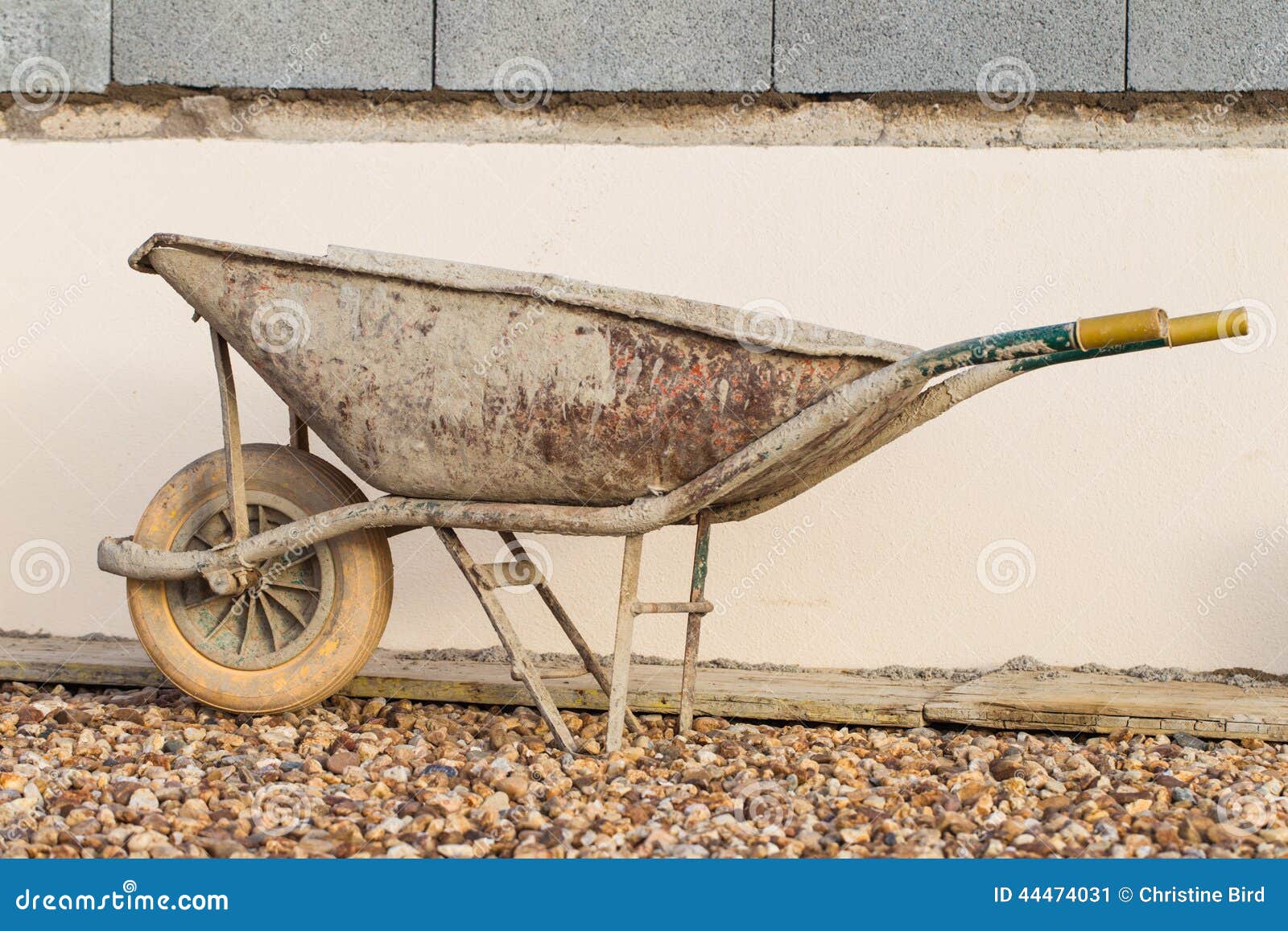 A Muddy Construction Site Wheelbarrow Stock Image - Image of plank ...