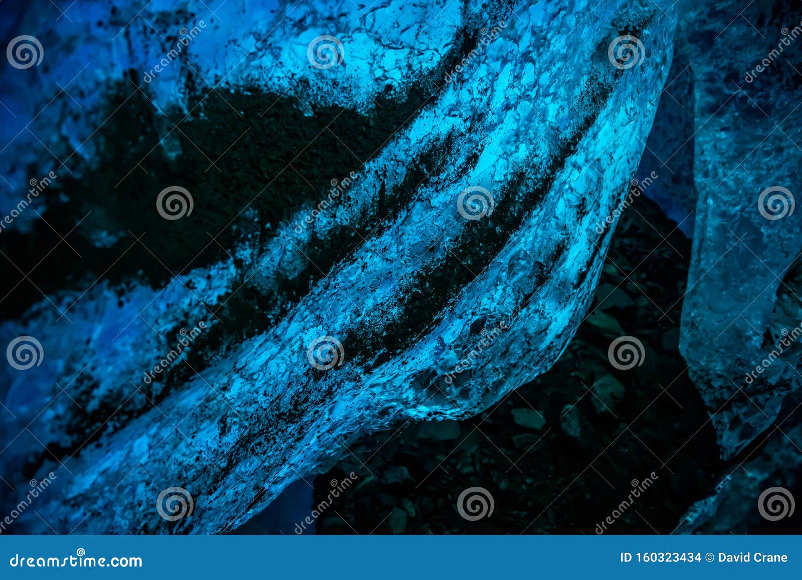 Muddy, Cracked Ice Deep Inside an Ice Cave in Canada. Ice Texture and ...