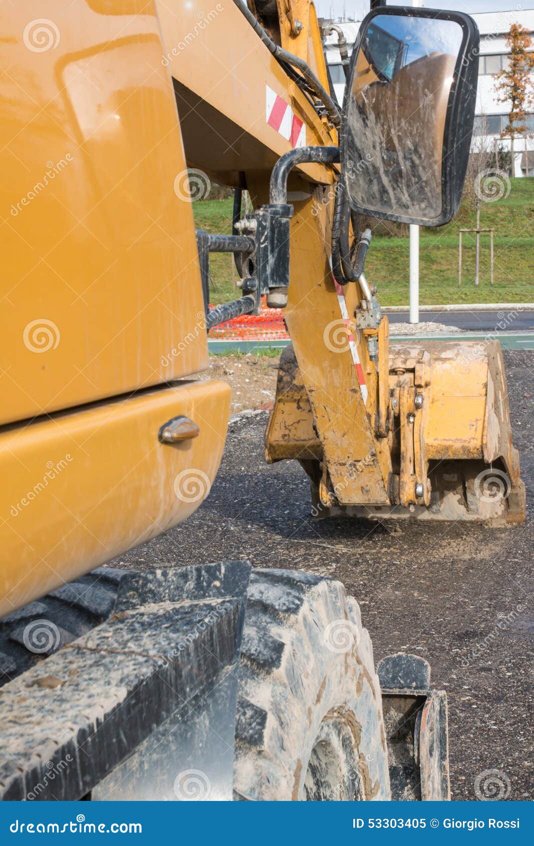 Muddy Excavator Shovel with Rear-view Mirror at Construction are Stock ...