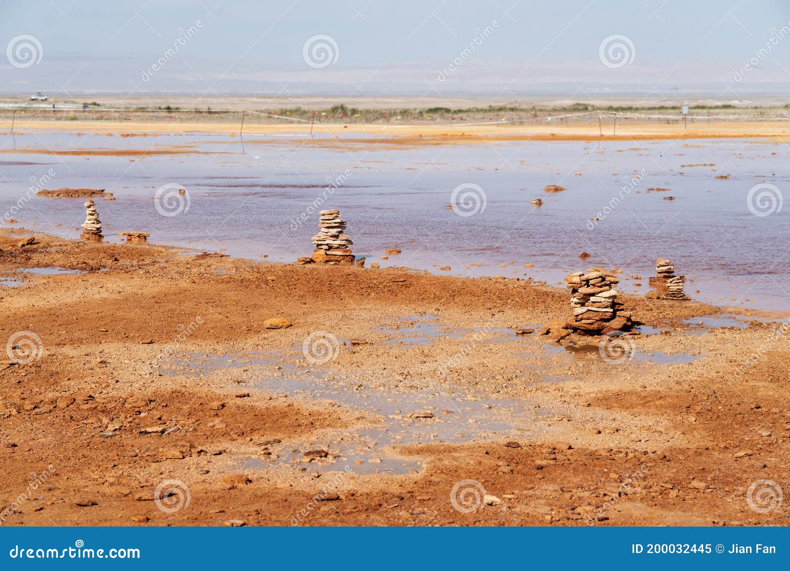 Muddy Ground with Spring Water, with Stacks of Stones on One Side Stock ...