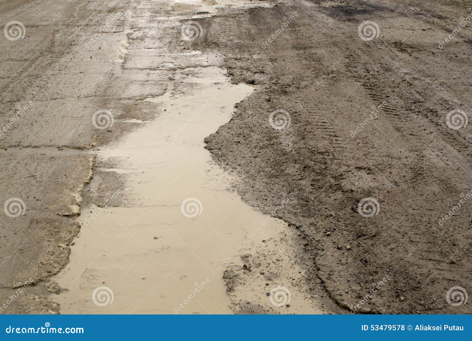 Muddy puddle on road stock photo. Image of build, construction - 53479578