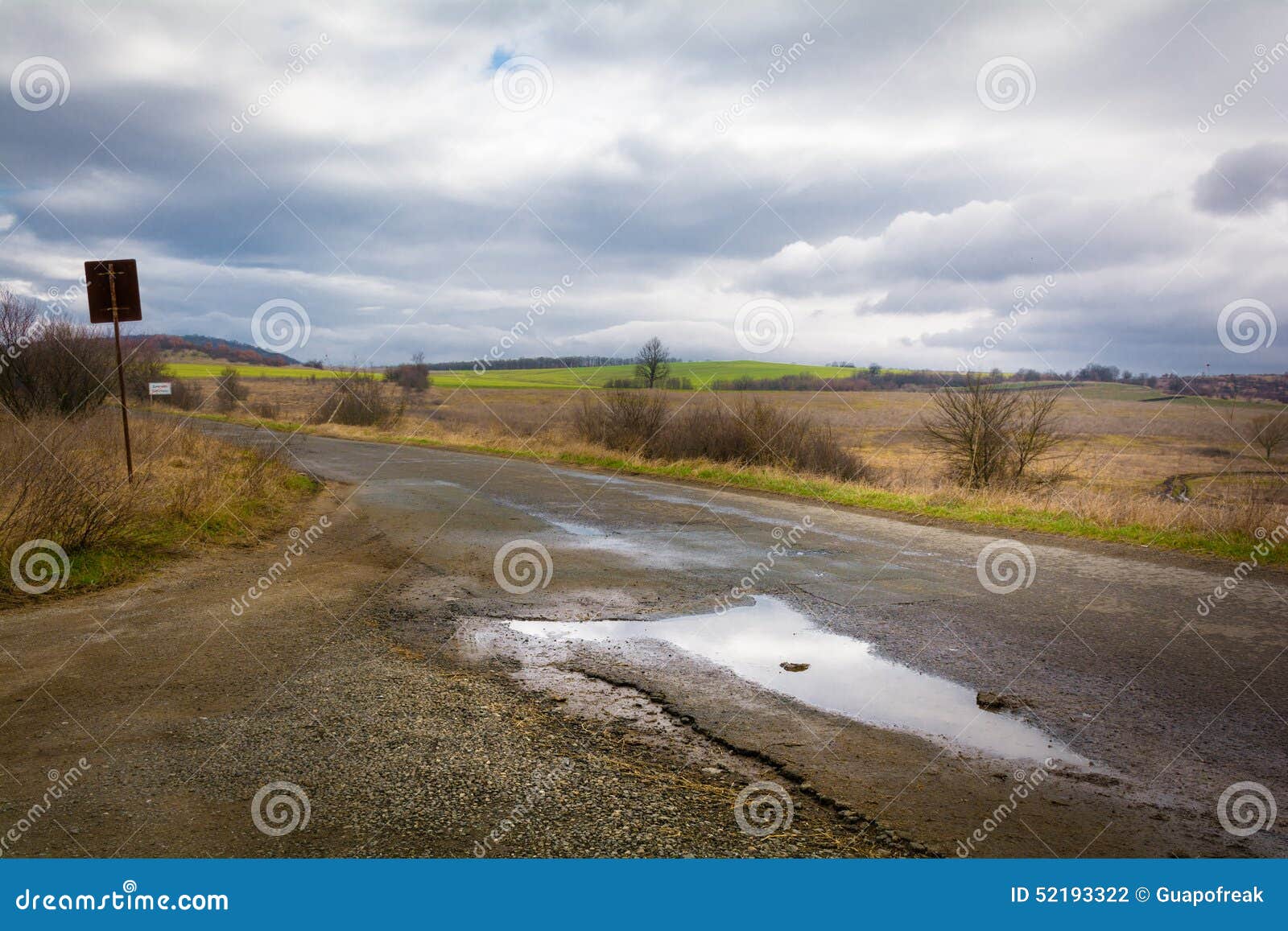 Muddy Street in a Village with Puddle Stock Photo - Image of road ...