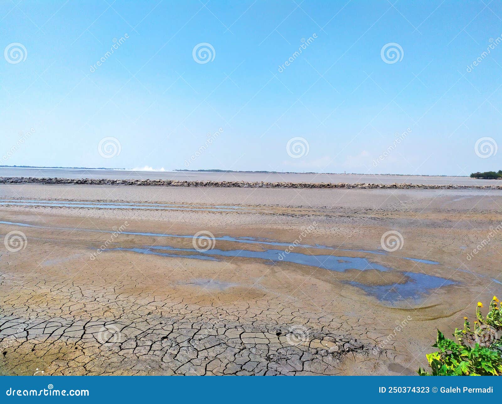 Mudflow Center stock image. Image of wave, cloud, coast - 250374323